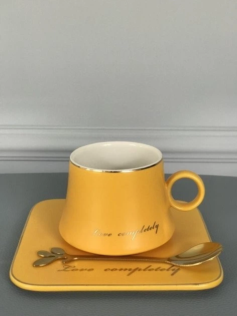 Чашка керамічна з блюдцем та ложкою Olens Автобіографія 150 мл жовтий купити онлайн на Rozetka