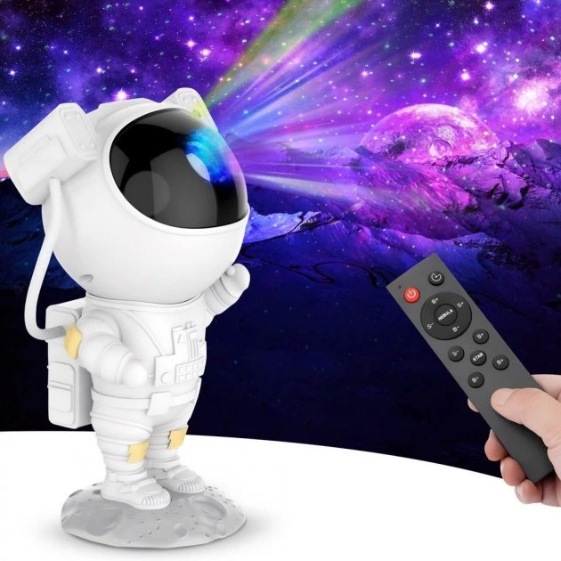 Лазерний нічник проектор зоряного неба астронавт космонавт проєктор галактики з пультом 24х12 см